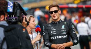 George Russell teases Sky F1's David Croft with Red Bull boycott joke ...